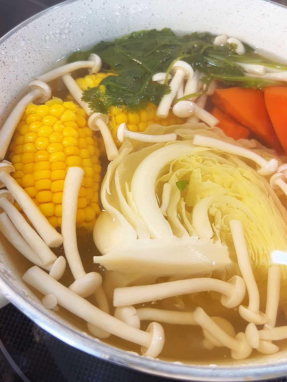 Tofu Soup (flower-shaped tofu with miso and vegetable broth)